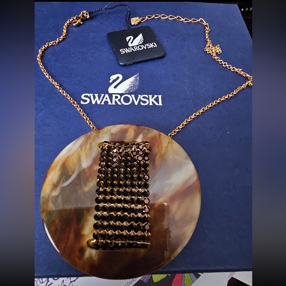 Swarovski | Jewelry | Swarovski Round Pendant Necklace With Tan Colored ...